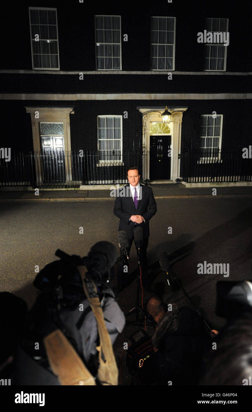 Prime Minister David Cameron speaks to the media outside 10 Downing ...