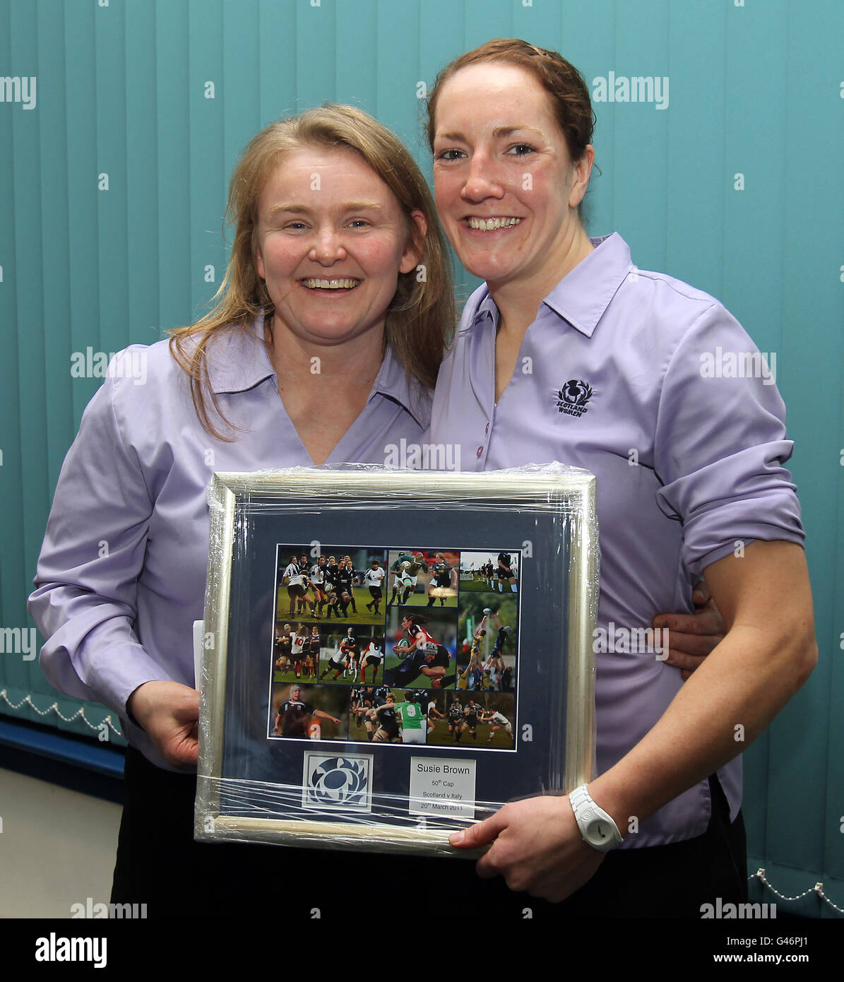 Scotland Captain Suzie Brown (right) is presented with a framed picture ...