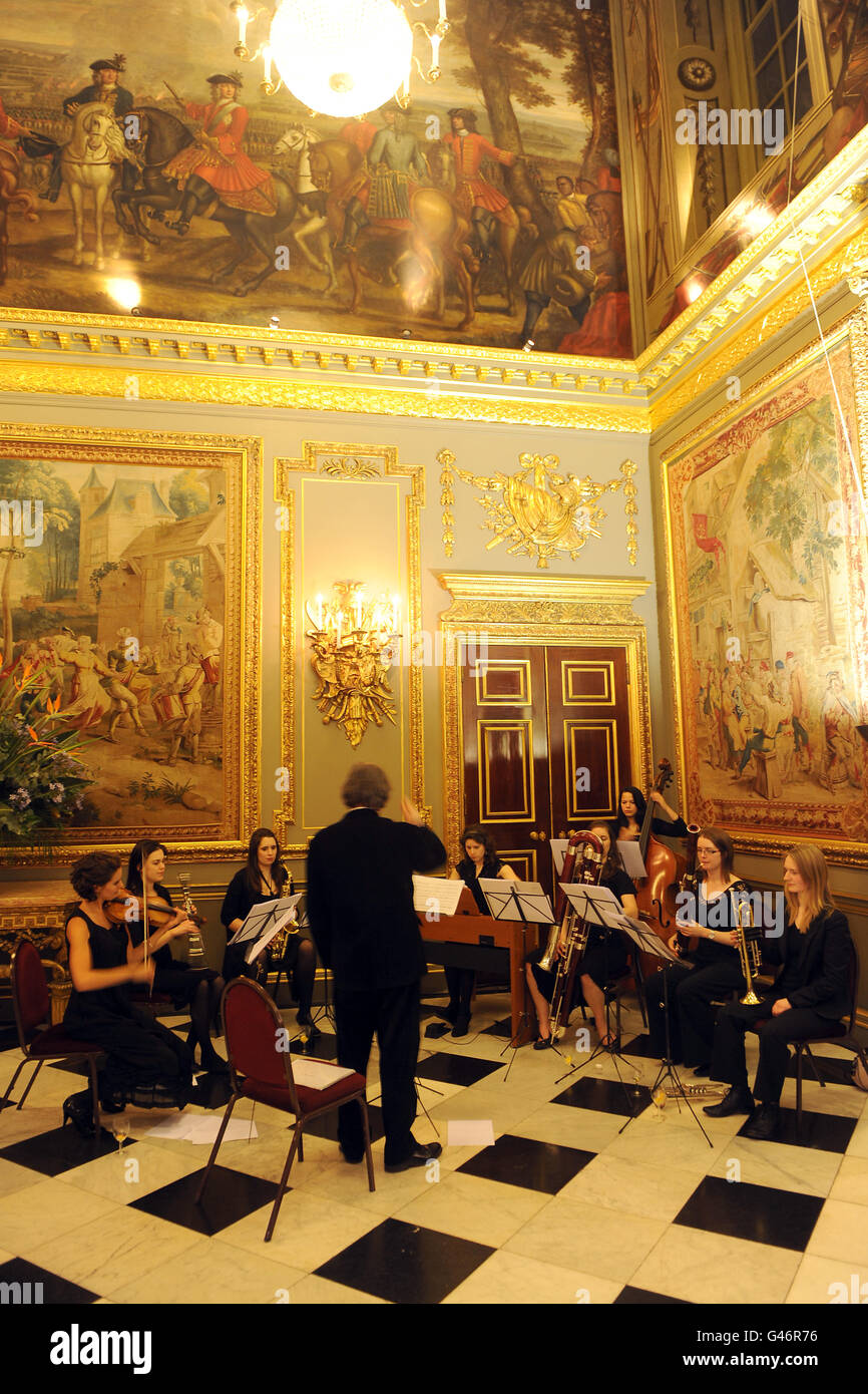 A small orchestra performs druing the Commonwealth Day reception at ...