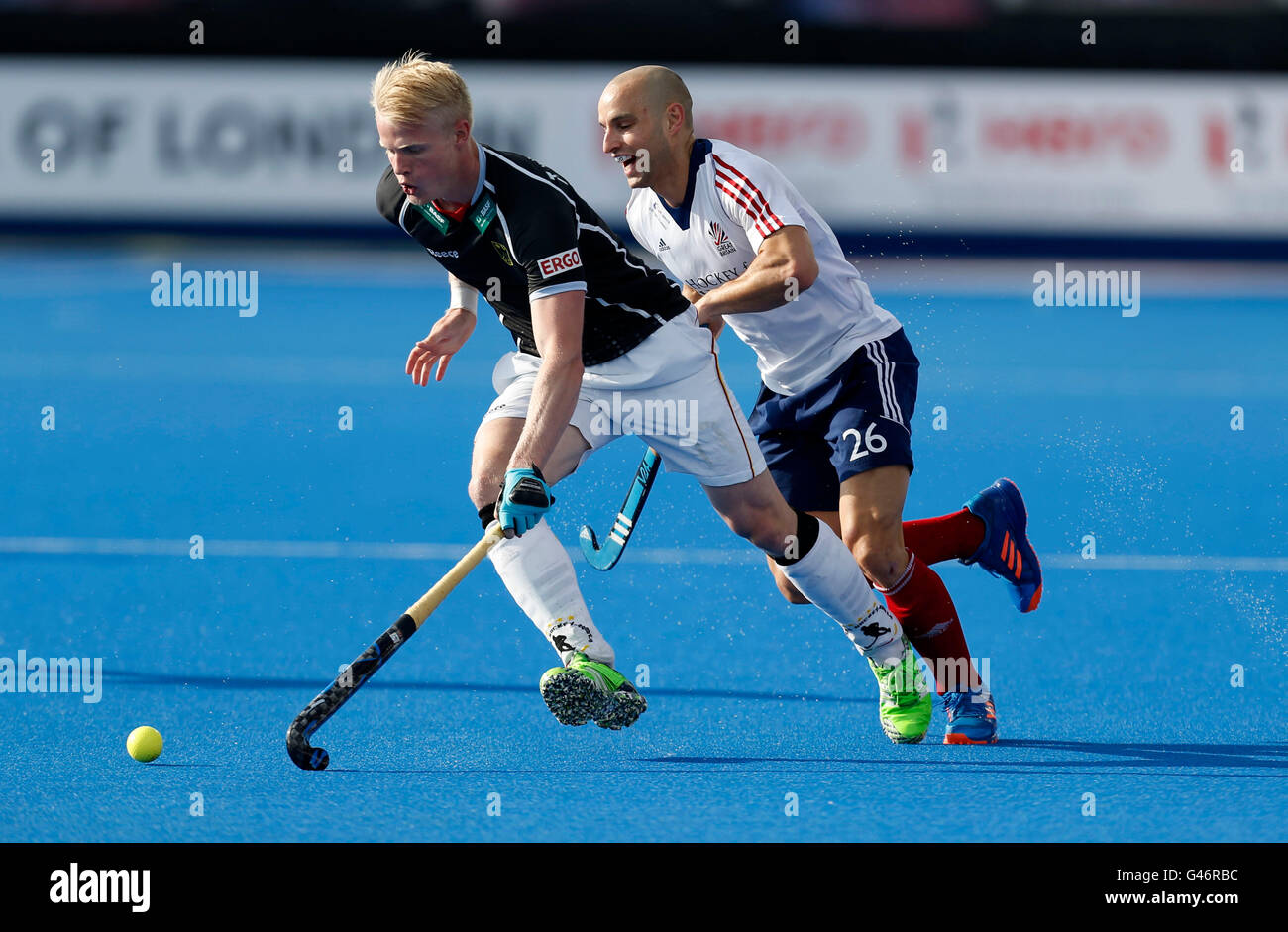 Germany's Tom Grambusch (left) and Great Britain's Nick Catlin during ...