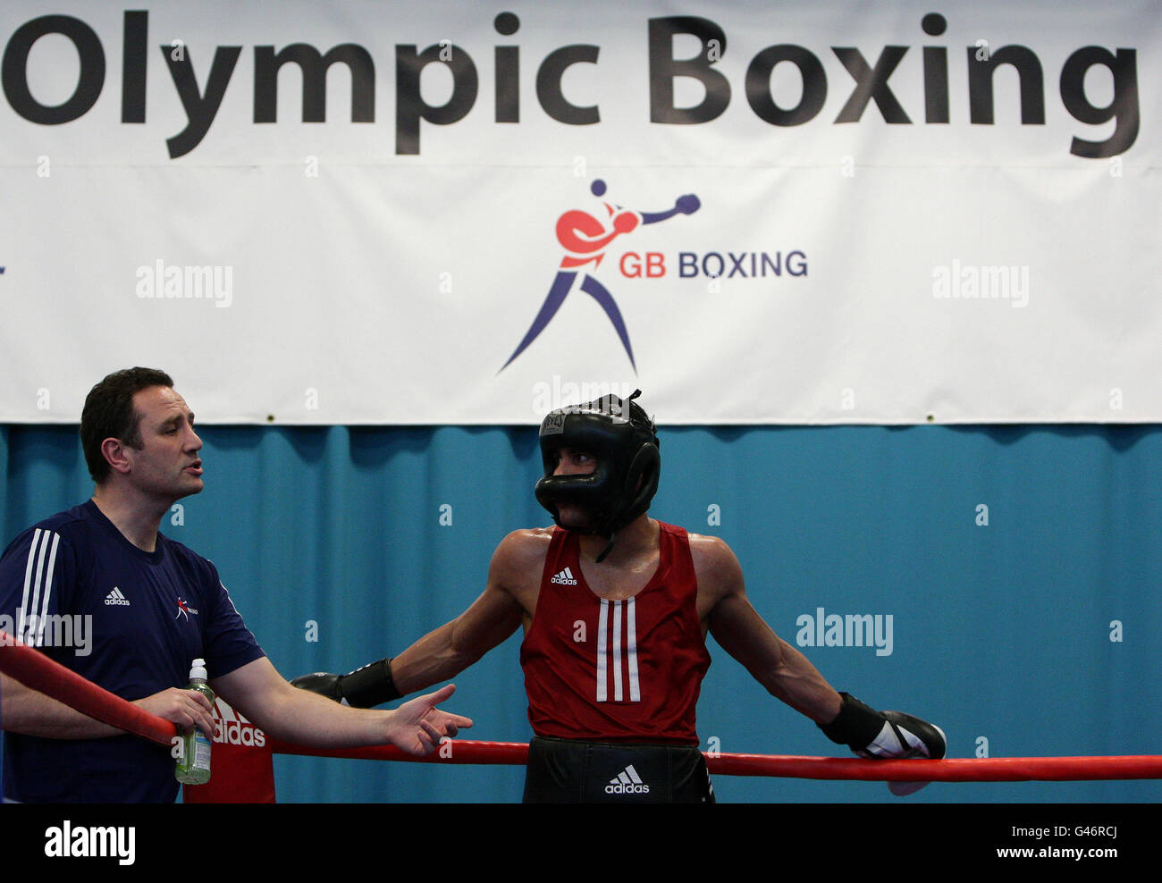 GB Boxing's Performance Director Rob McCracken (left) talks to young ...