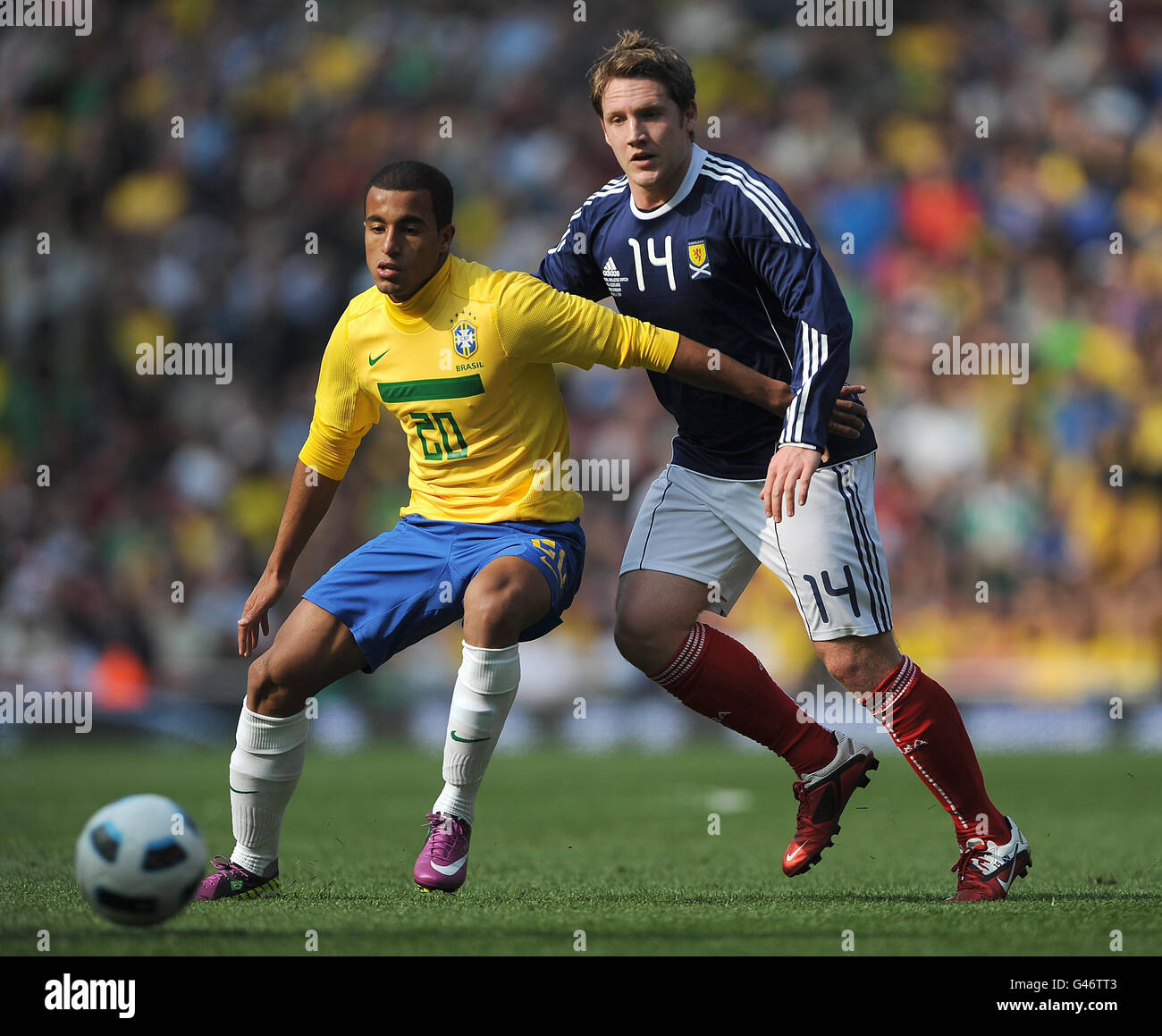 Football soccer scotland full length tackling mangsm hi-res stock ...