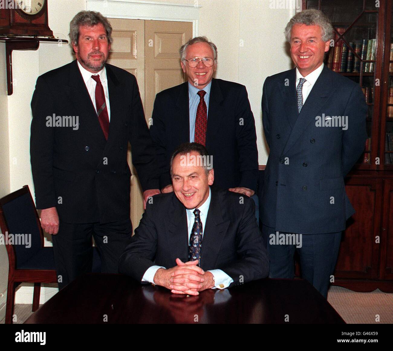 Jack Cunningham the new Minister of Agriculture (seated) at his desk in ...