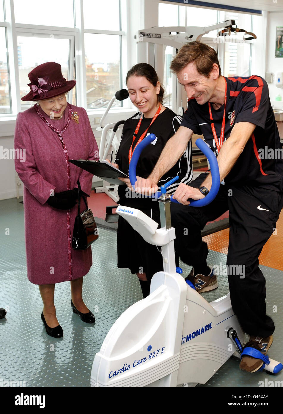 Queen Elizabeth II watches students study fitness tests in action, as ...