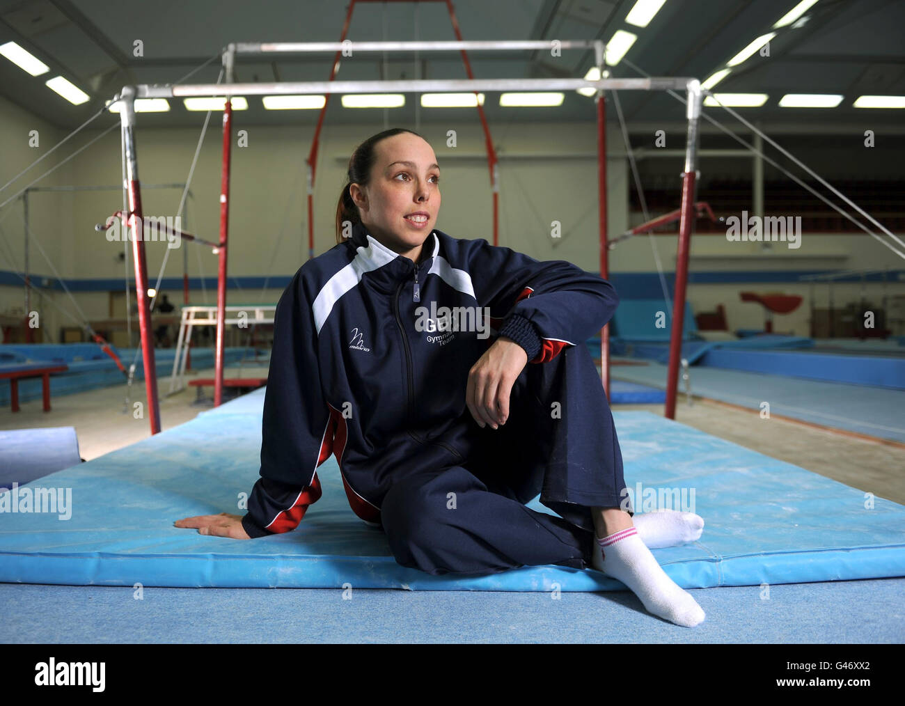 Beth Tweddle poses beside the uneven bars during a training session at ...