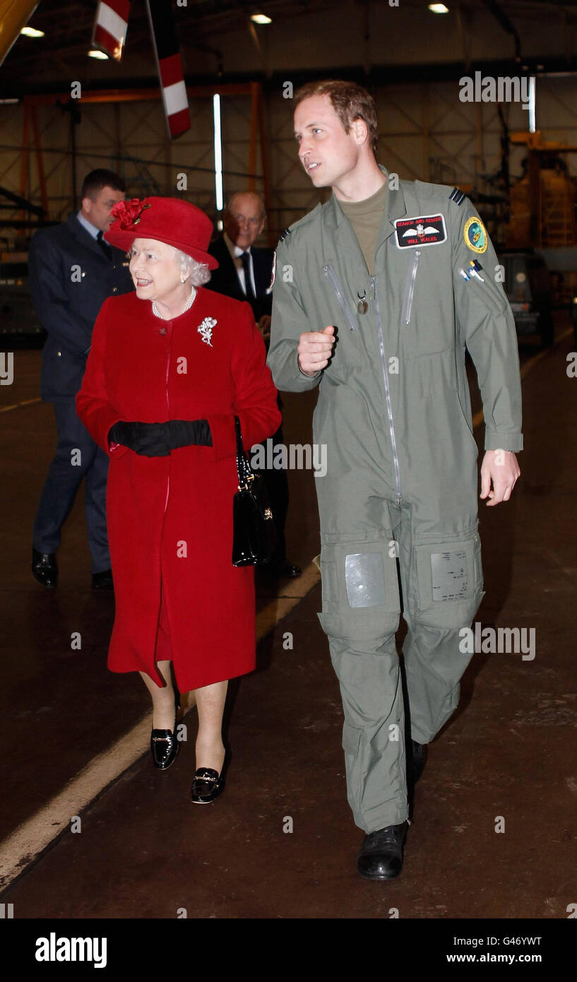 Prince William shows Britain's Queen Elizabeth II the hanger where the ...