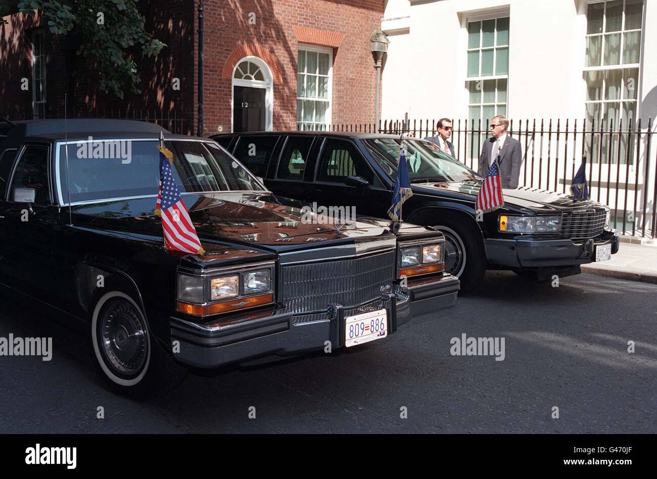Two cars from President Clinton's motorcade are parked in Downing ...