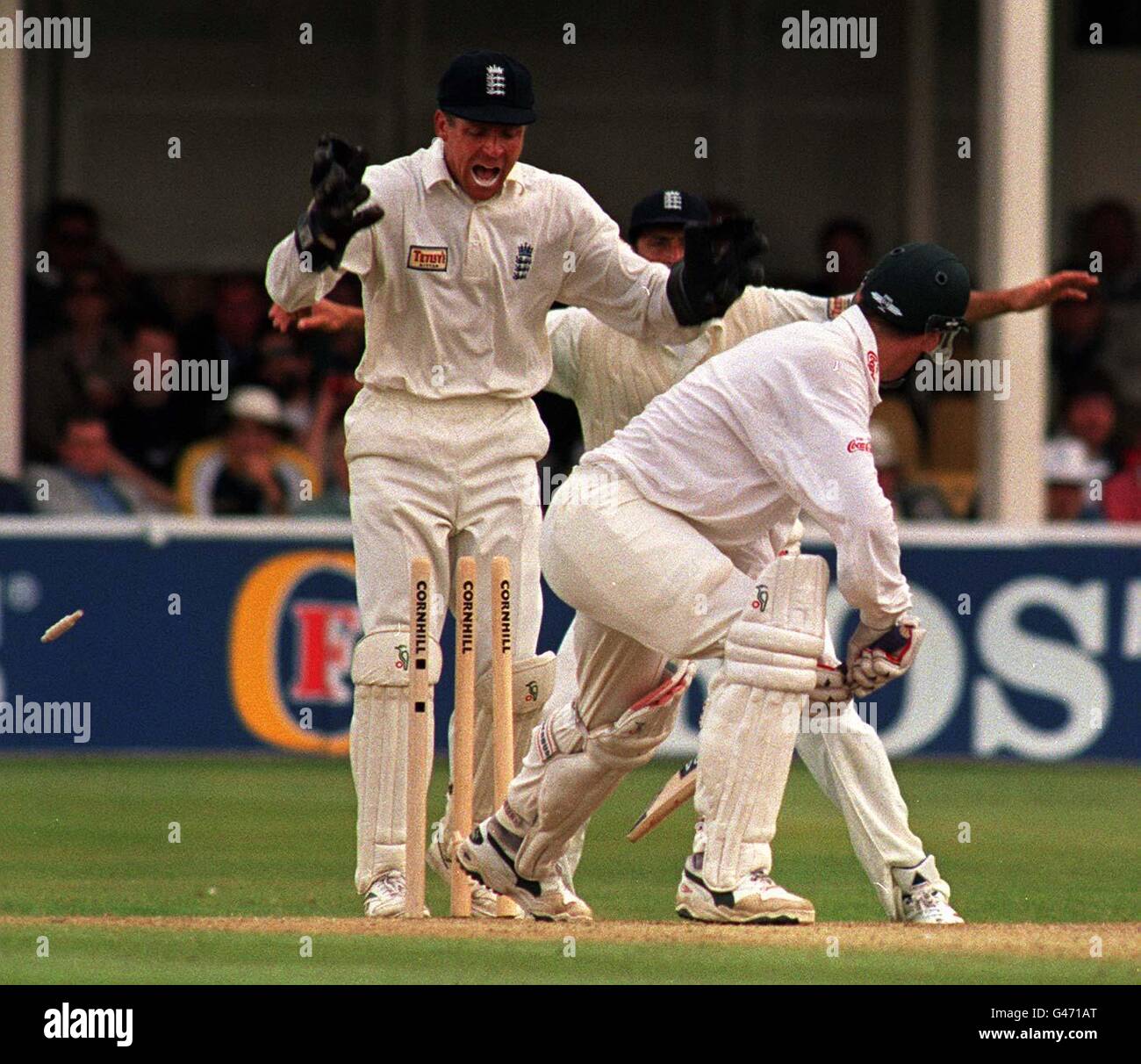 Alec Stewart cheers as Mathew Elliott is bowled by Robert Croft in the ...