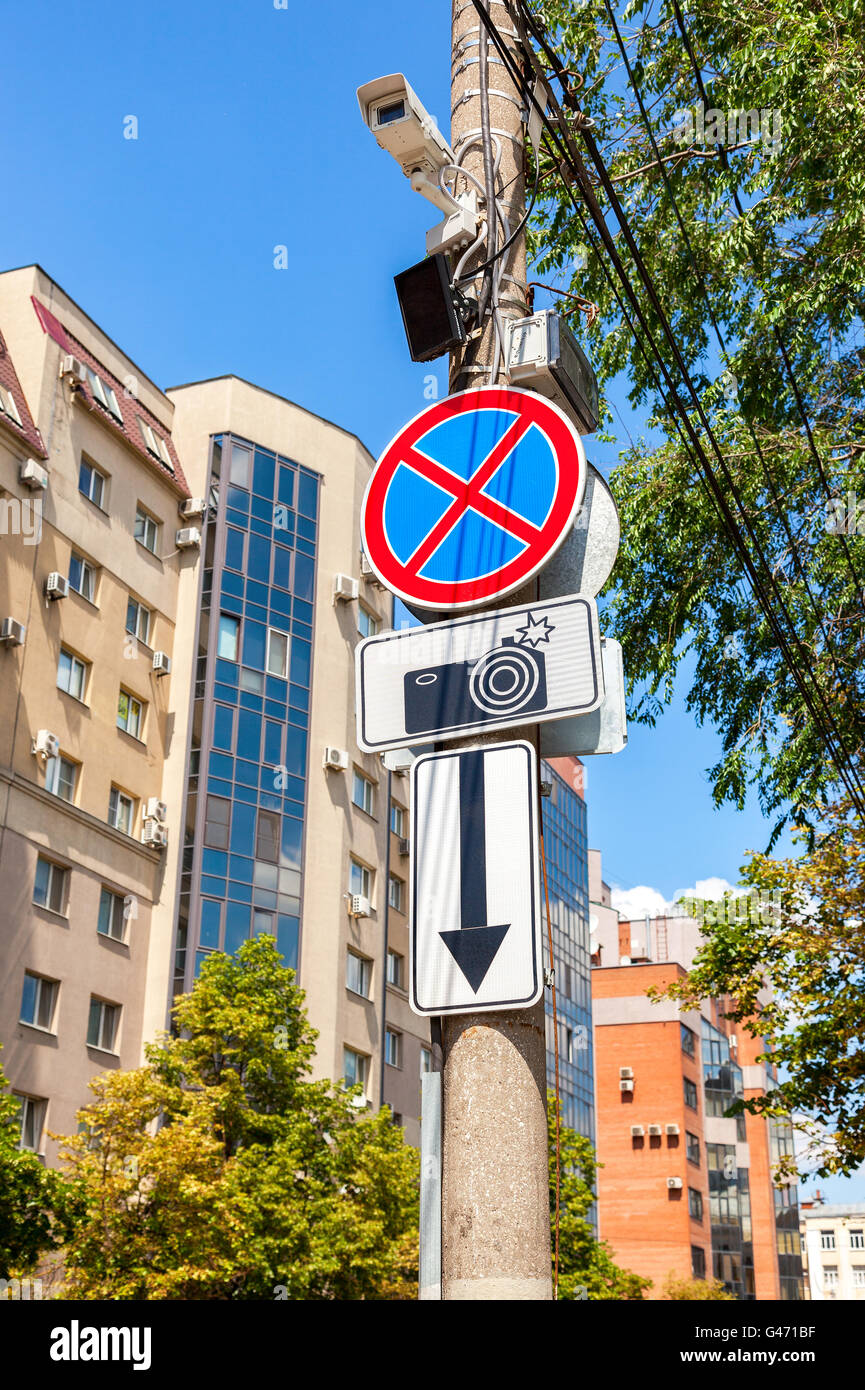 Traffic sign prohibiting parking with CCTV camera and other equipment ...