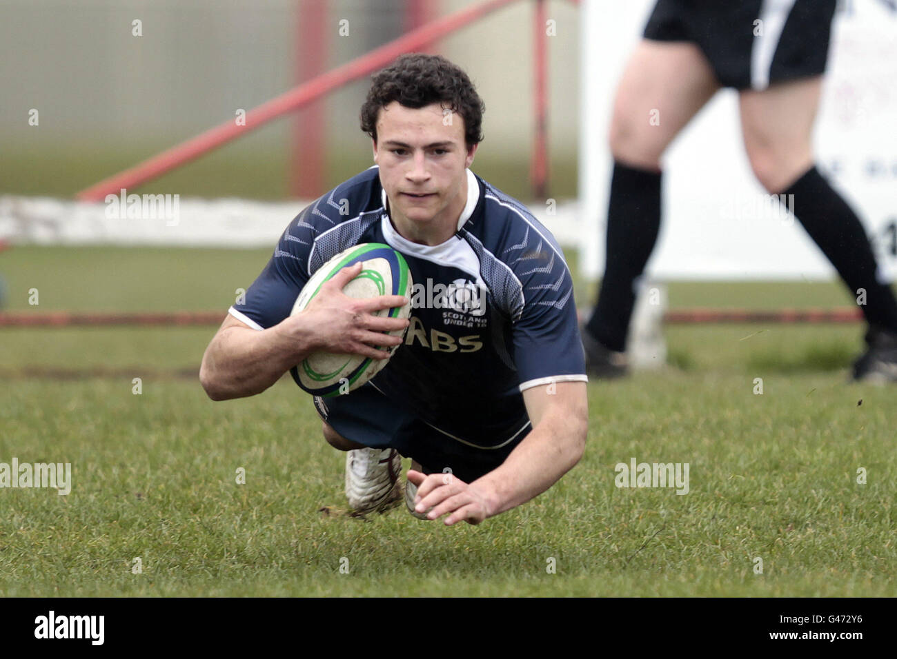 Scotland under-18's Jamie Farndale scores a try during the match at ...