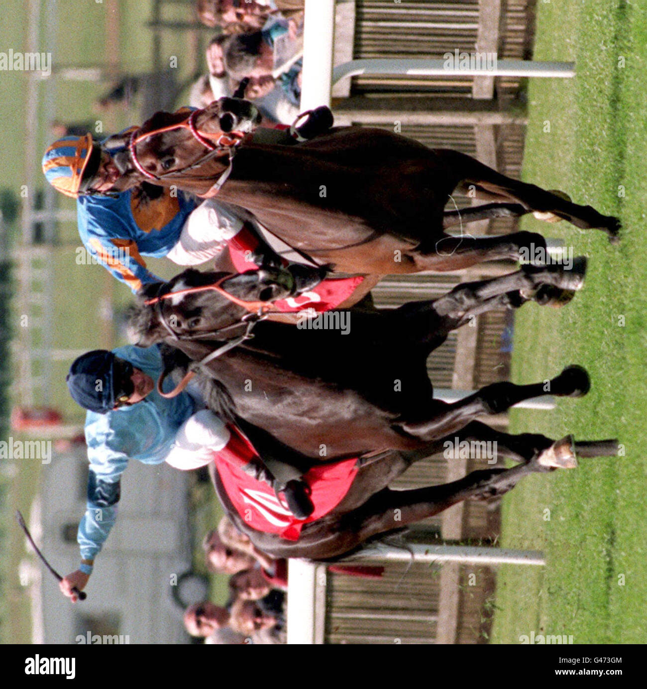 Left to Right: 'Reunion' with Richard Hills up, takes the lead from 'Oh ...