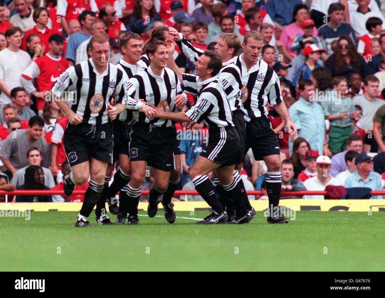 Newcastle United's Robbie Elliott (3rd from left) celebrates with his ...