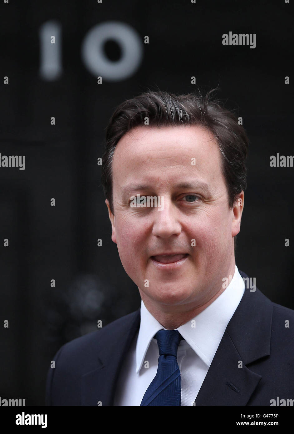 Prime minister david cameron walks out of 10 downing street hi-res ...