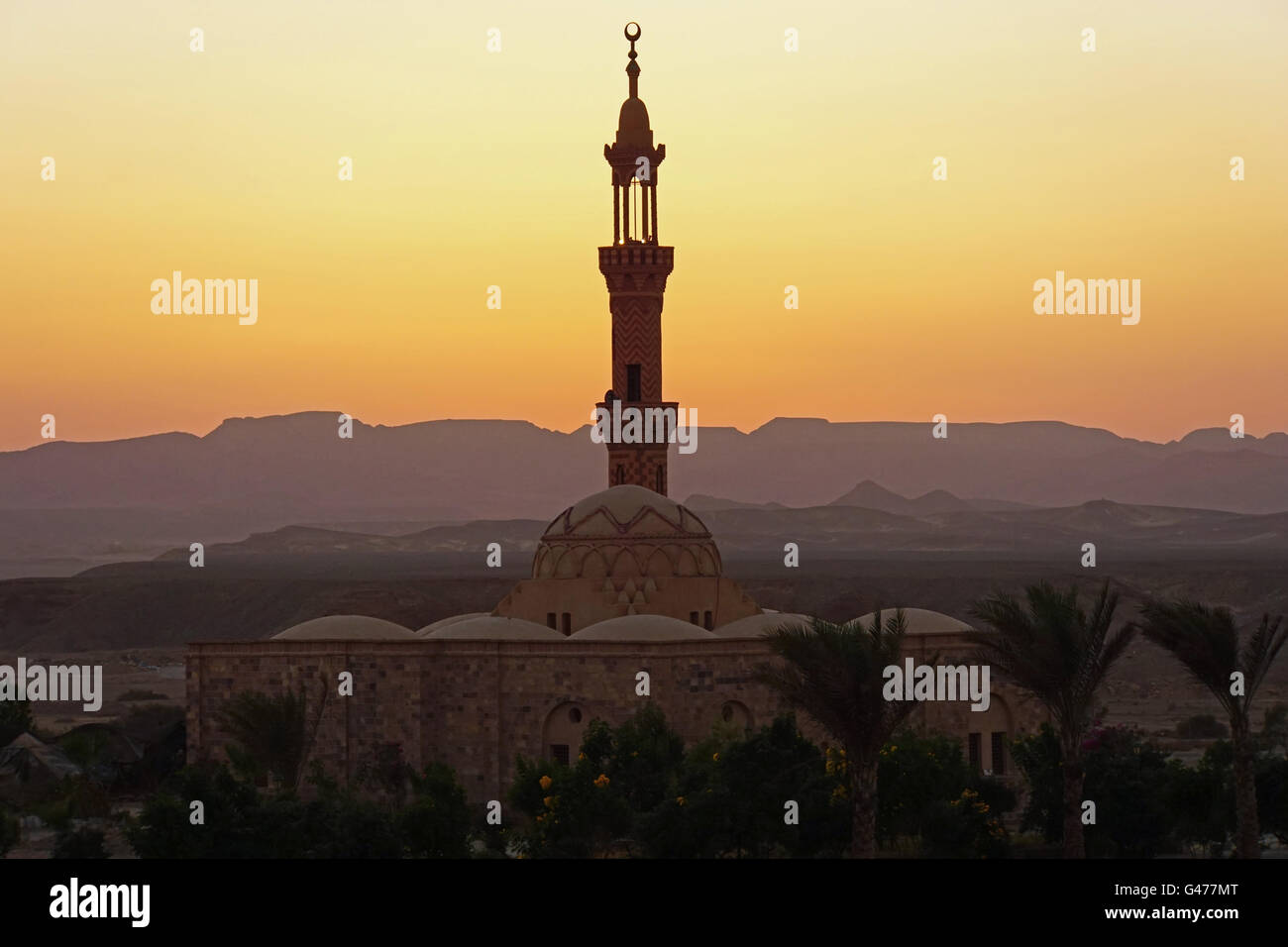 sunset over mosque in egypt town of el quesir Stock Photo - Alamy
