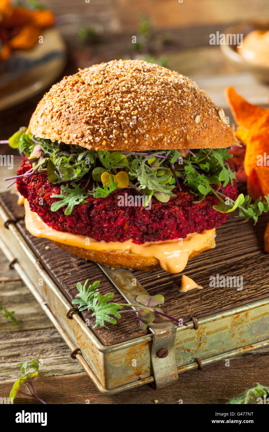 Healthy Baked Red Vegan Beet Burger with Microgreens Stock Photo - Alamy