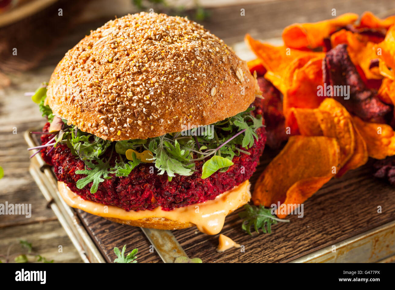 Healthy Baked Red Vegan Beet Burger with Microgreens Stock Photo - Alamy