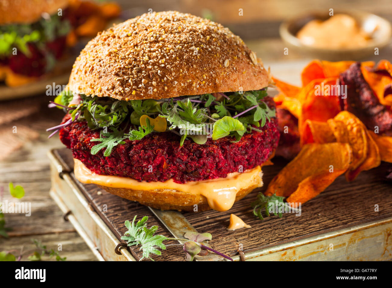 Healthy Baked Red Vegan Beet Burger with Microgreens Stock Photo - Alamy