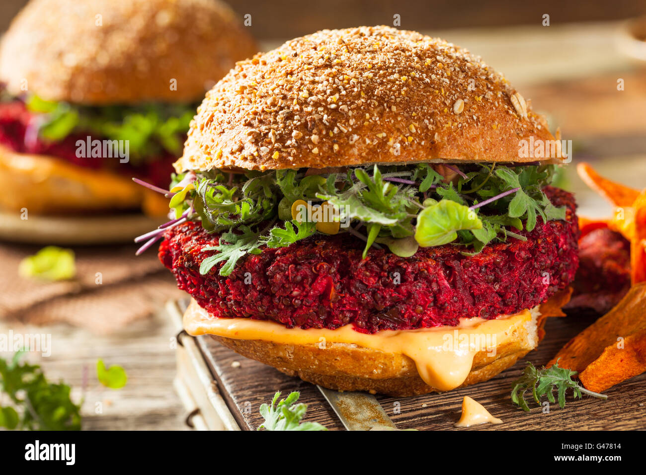 Healthy Baked Red Vegan Beet Burger with Microgreens Stock Photo - Alamy