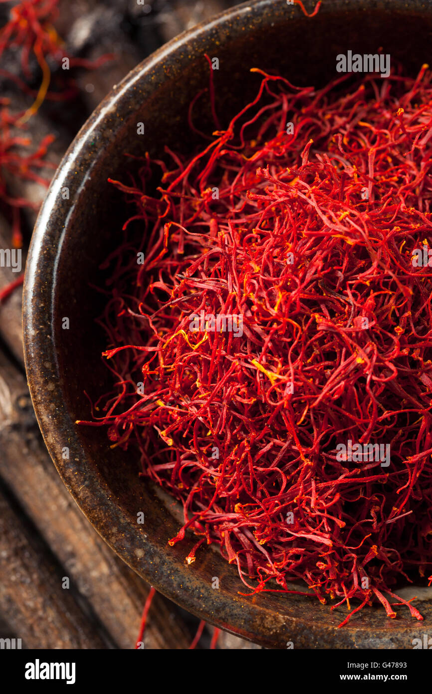 Raw Organic Red Saffron Spice in a Bowl Stock Photo - Alamy