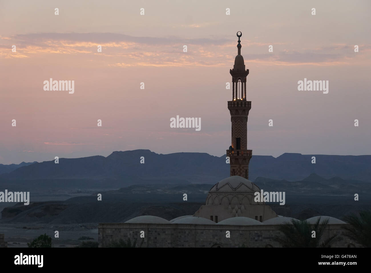 sunset over mosque in egypt town of el quesir Stock Photo - Alamy