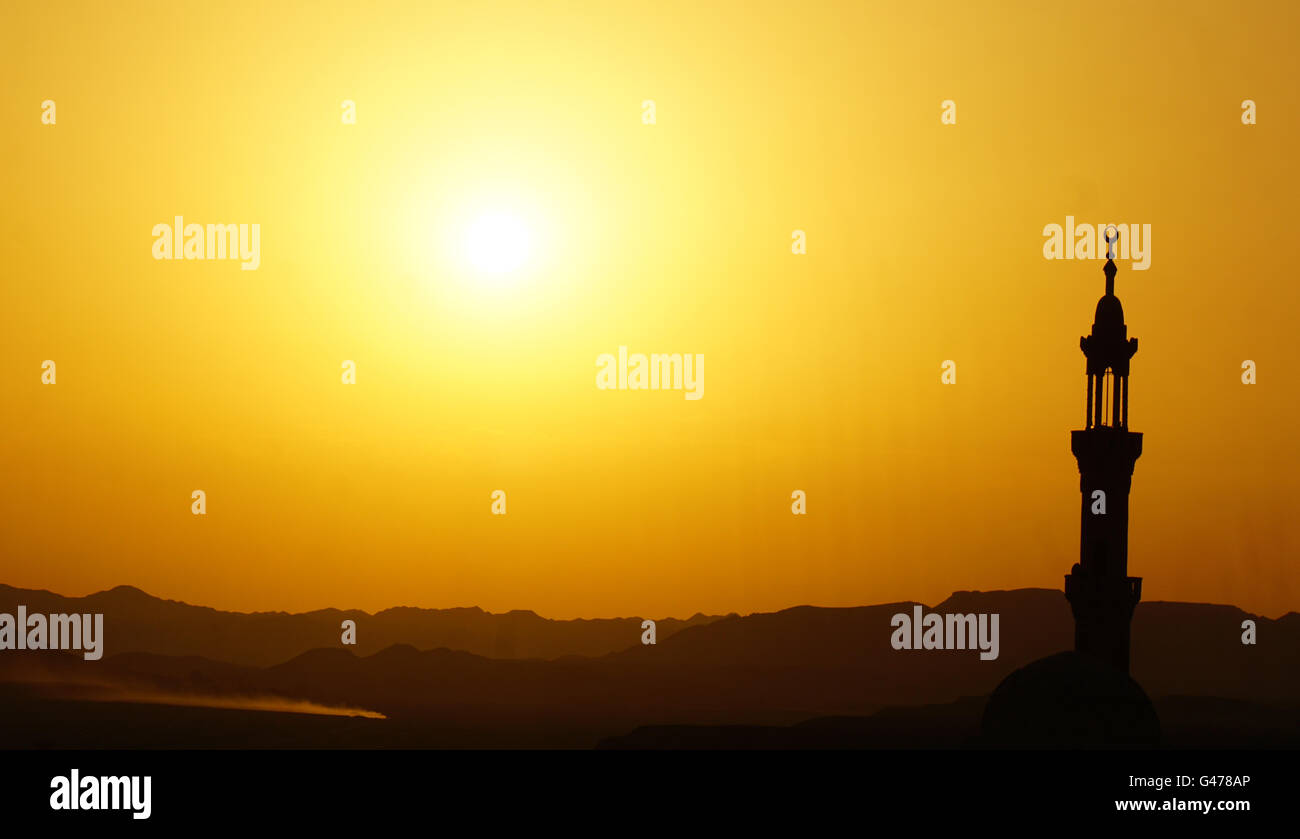 sunset over mosque in egypt town of el quesir Stock Photo - Alamy