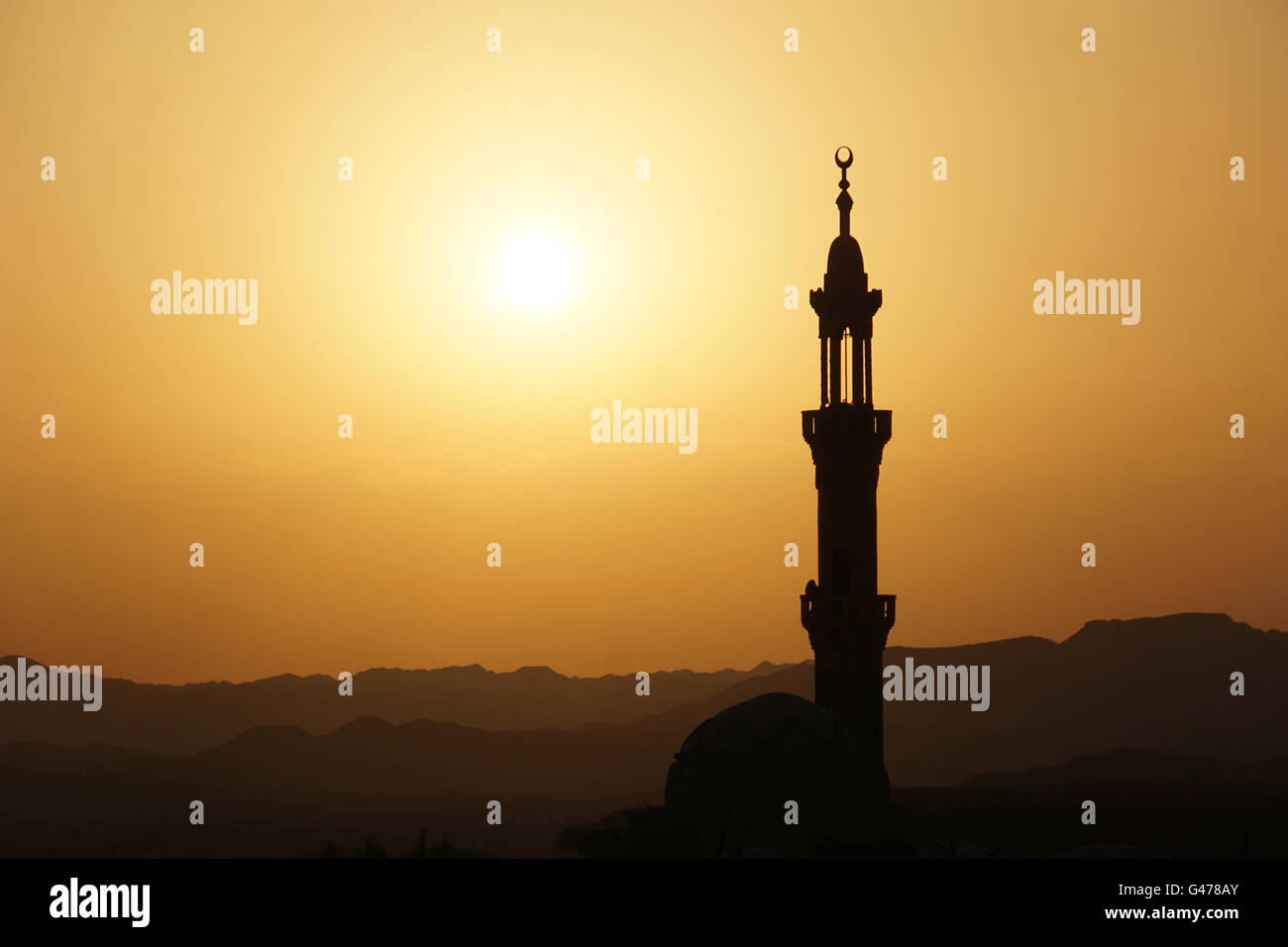sunset over mosque in egypt town of el quesir Stock Photo - Alamy