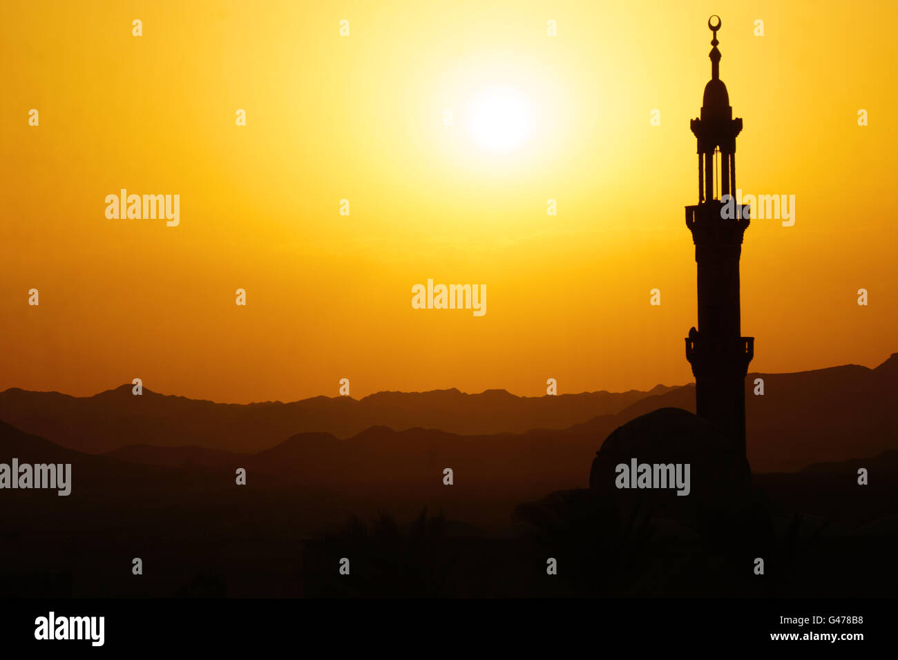 sunset over mosque in egypt town of el quesir Stock Photo - Alamy