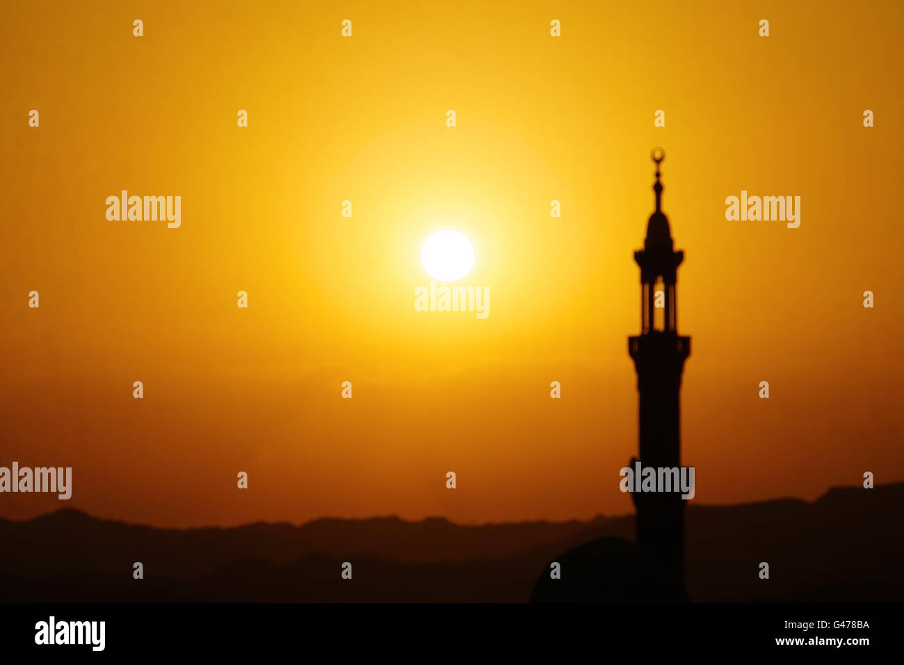 sunset over mosque in egypt town of el quesir Stock Photo - Alamy