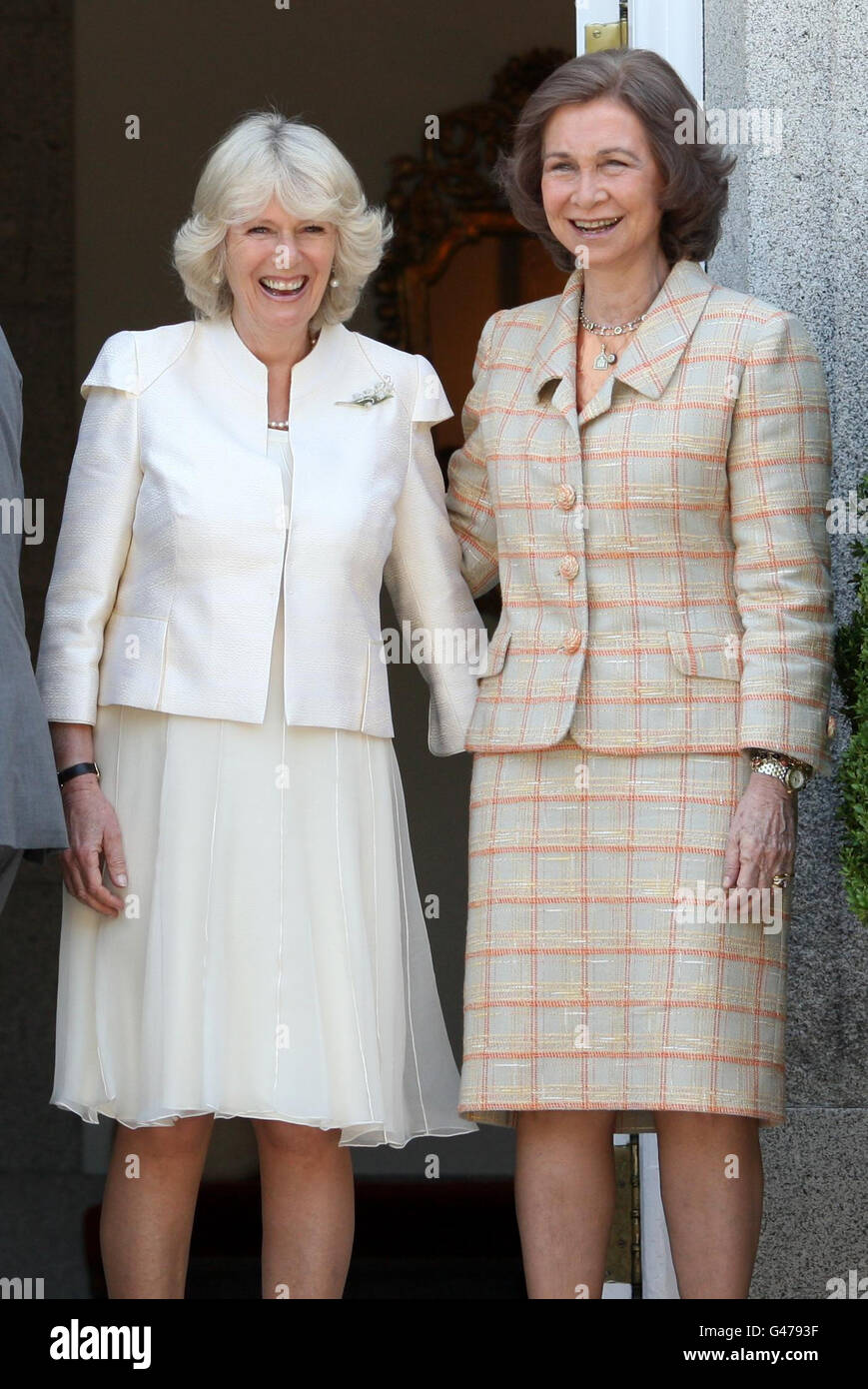 Queen Sofia of Spain, puts her arm around The Duchess of Cornwall ...
