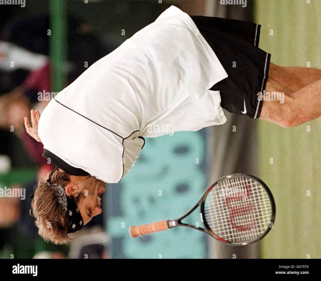 Britain's Greg Rusedski throws his racket in anger during the match ...