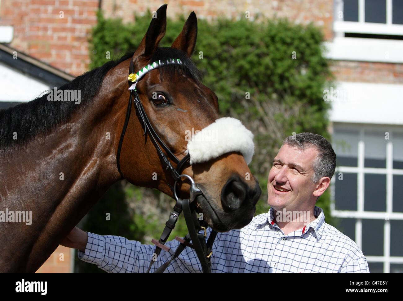Trainer Donald McCain Jnr (right) stands alongside Grand National ...