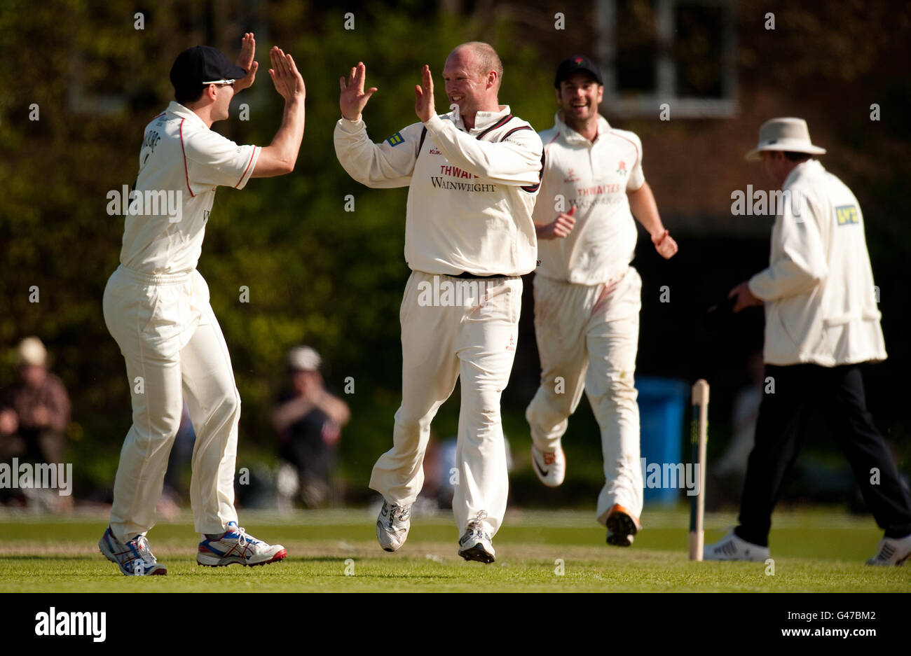 Lancashire's Gary Keedy celebrates dismissing with Stephen Moore after ...