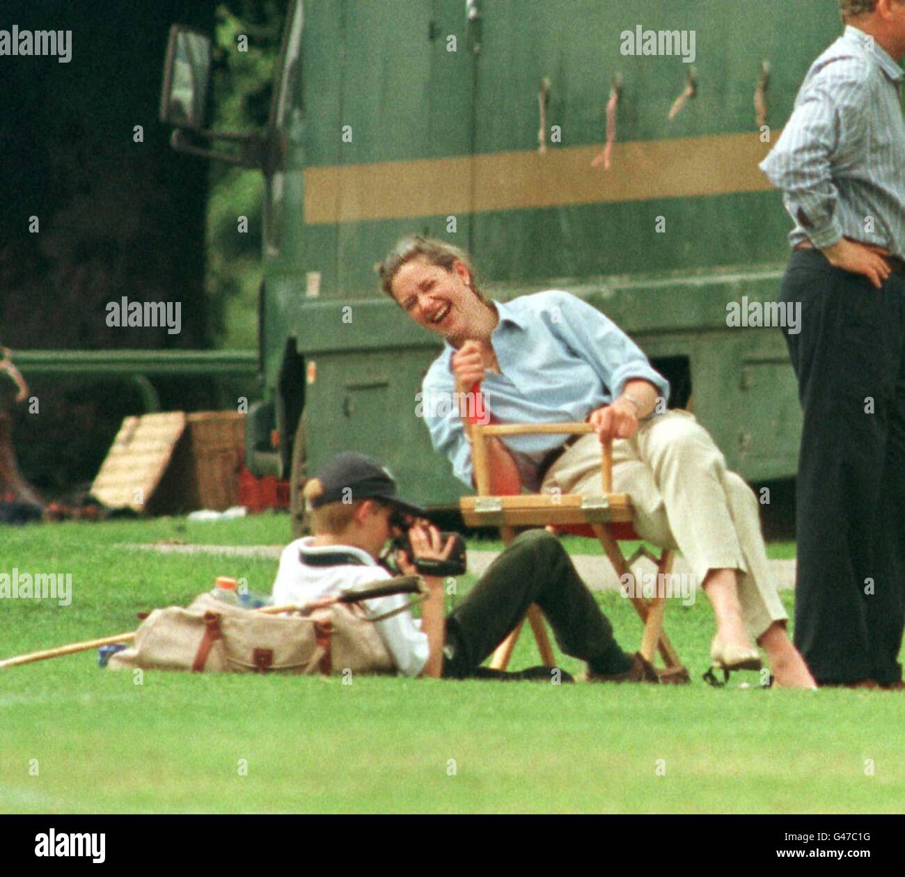 "Tiggy" Legge-Bourke laughs as Prince Harry films with a video camera ...