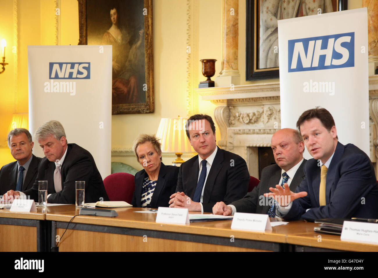Health secretary andrew lansley second left and other healthcare ...
