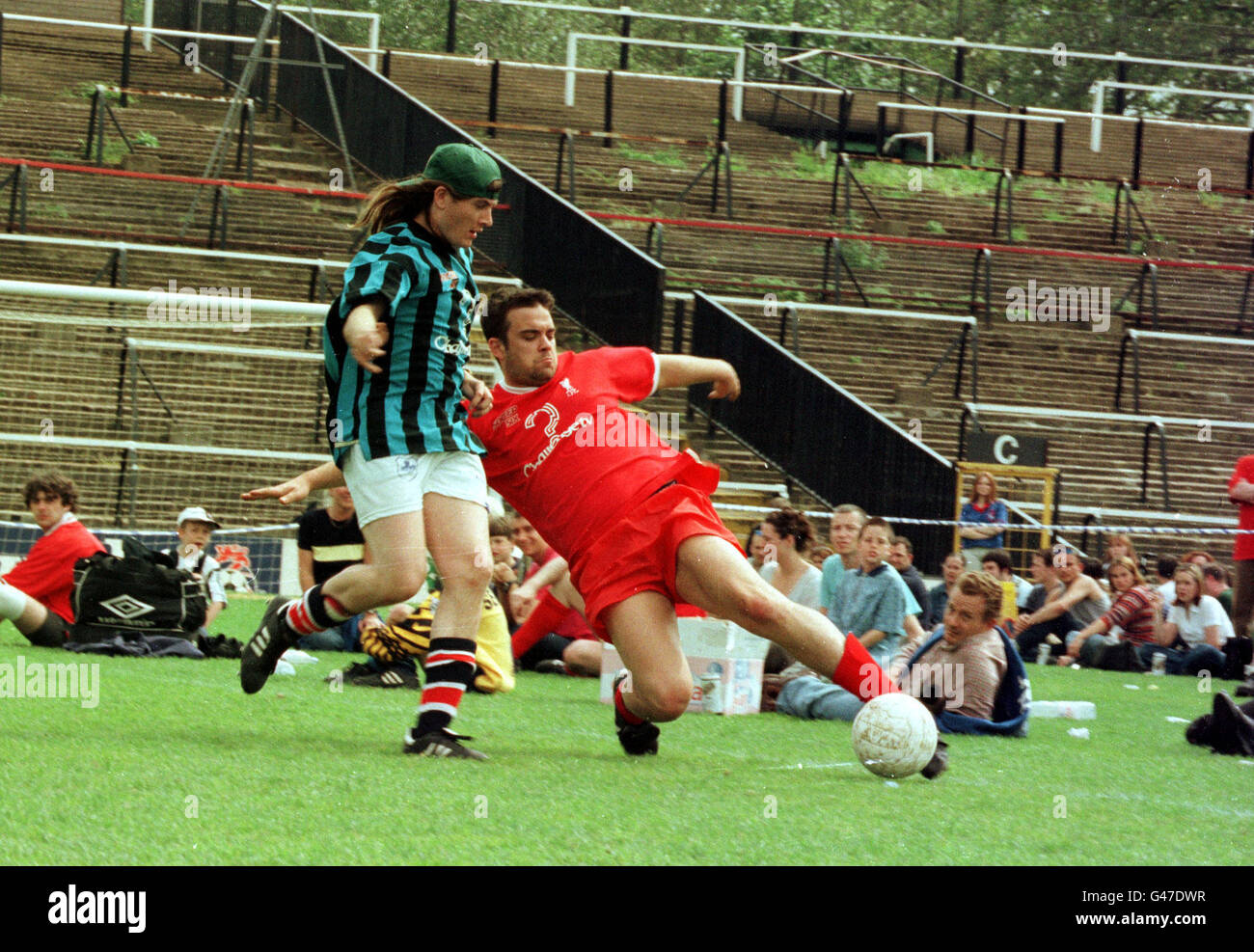 Robbie williams soccer six tournment hi-res stock photography and ...