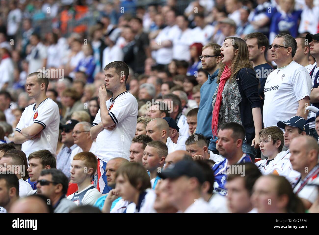 Shell shocked bolton wanderers fans look on in stands hi-res stock ...