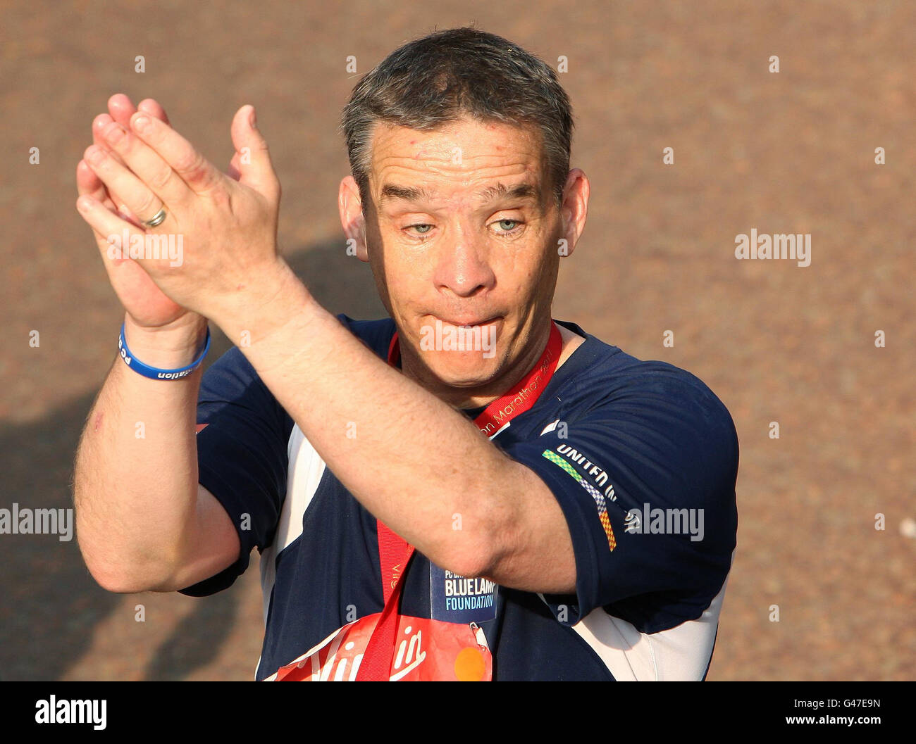 Completing half marathon hi-res stock photography and images - Alamy