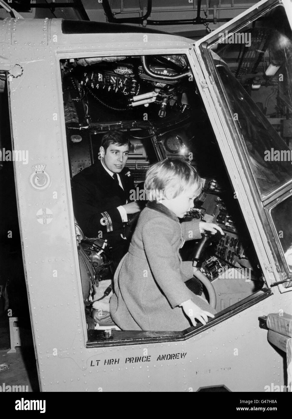Prince Andrew keeps a watchful eye on his three year old nephew Prince ...