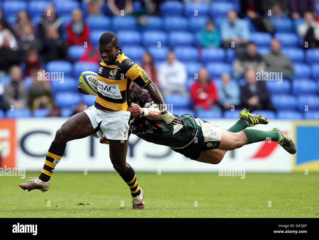 Wasps Christian Wade gets away from London Irish's Seilala Mapusua ...