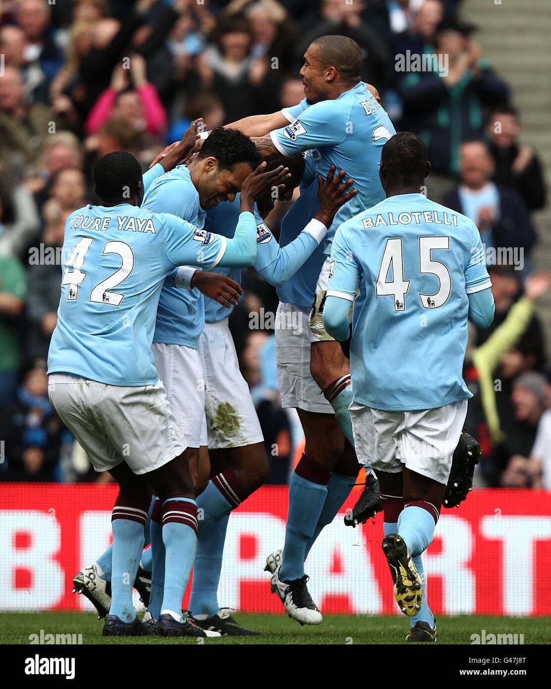 Manchester City's Patrick Vieira is mobbed by his team mates after ...