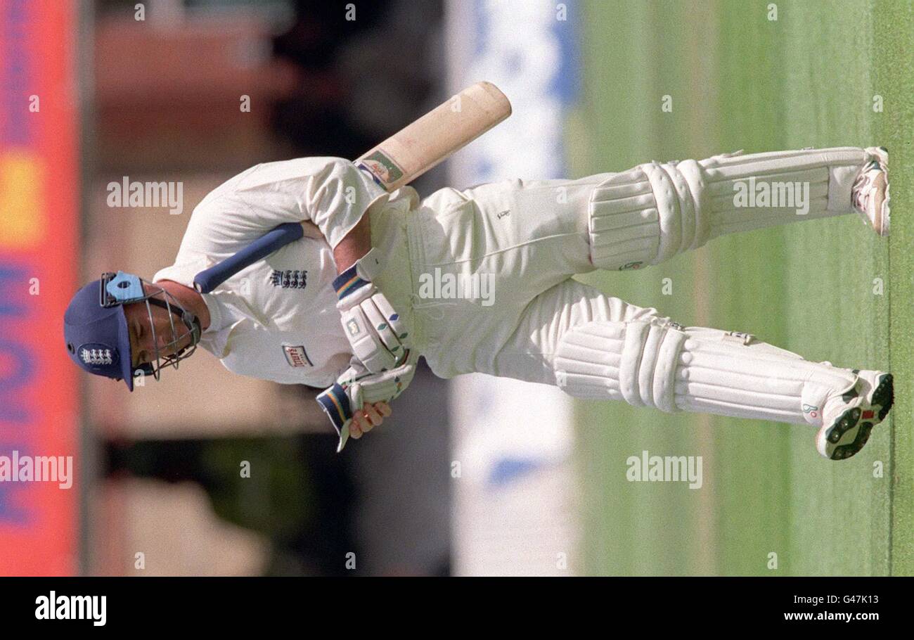 England's Graham Thorpe walks back to the pavillion after he was caught ...