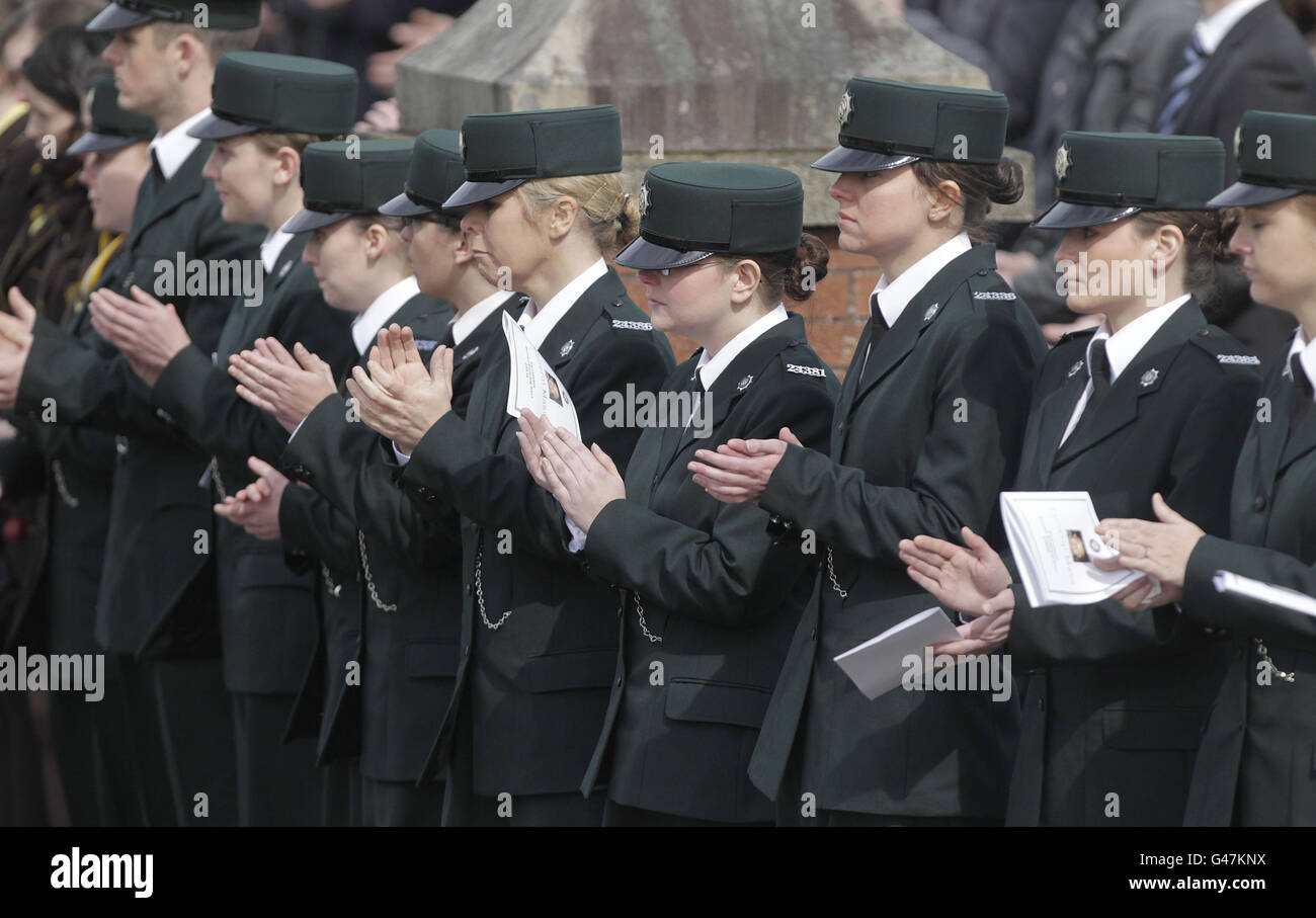 Fellow police officers attend the funeral of PSNI officer Ronan Kerr at ...