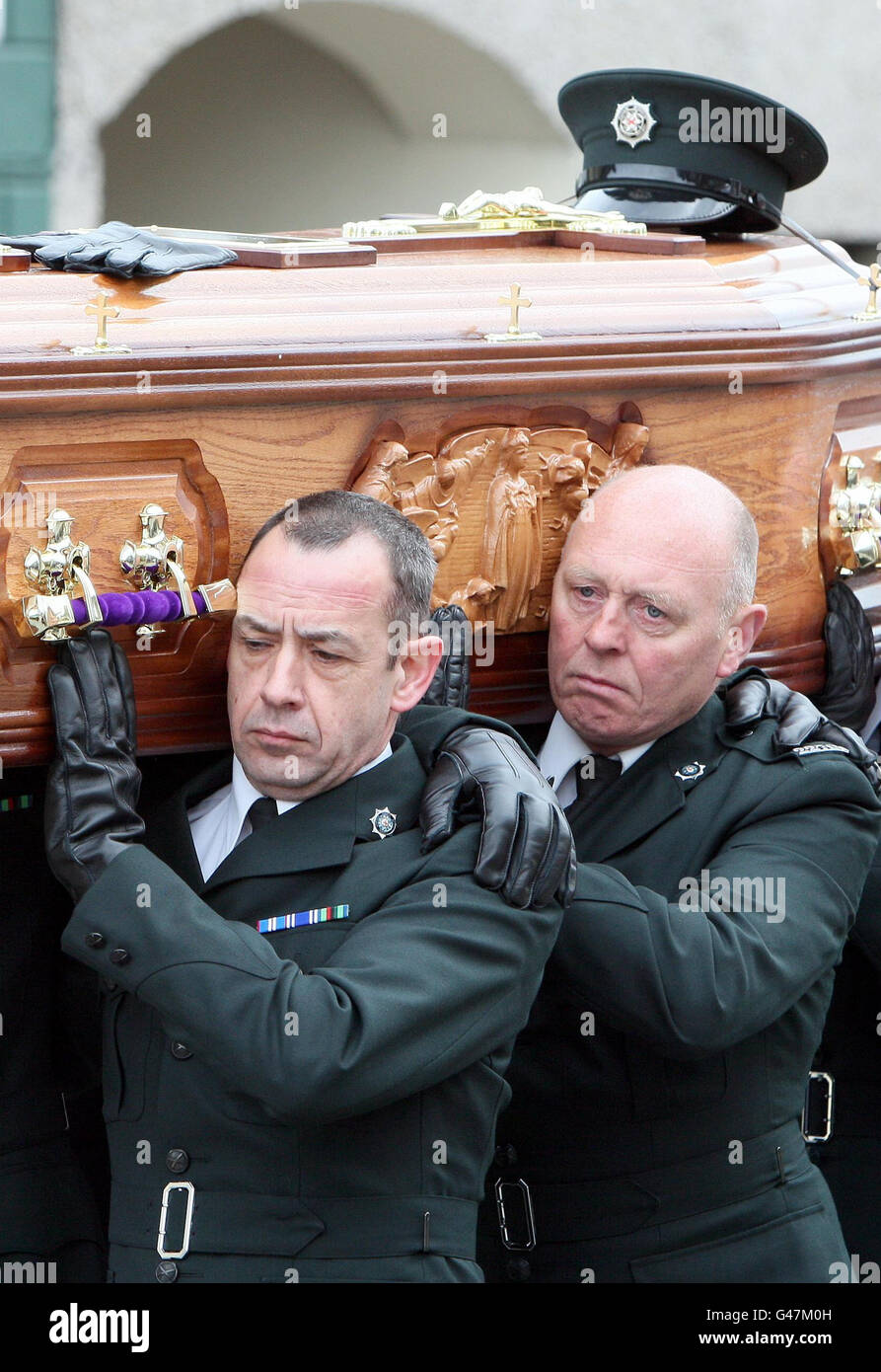 Ulster bombing. The coffin of PSNI Constable Ronan Kerr is carried ...