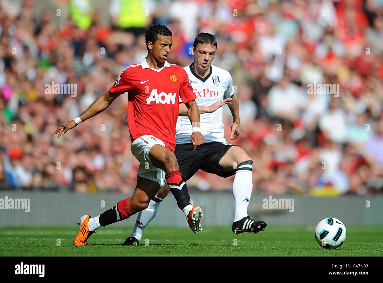 Fulham's Chris Baird (right) and Manchester United's Luis Nani (left ...
