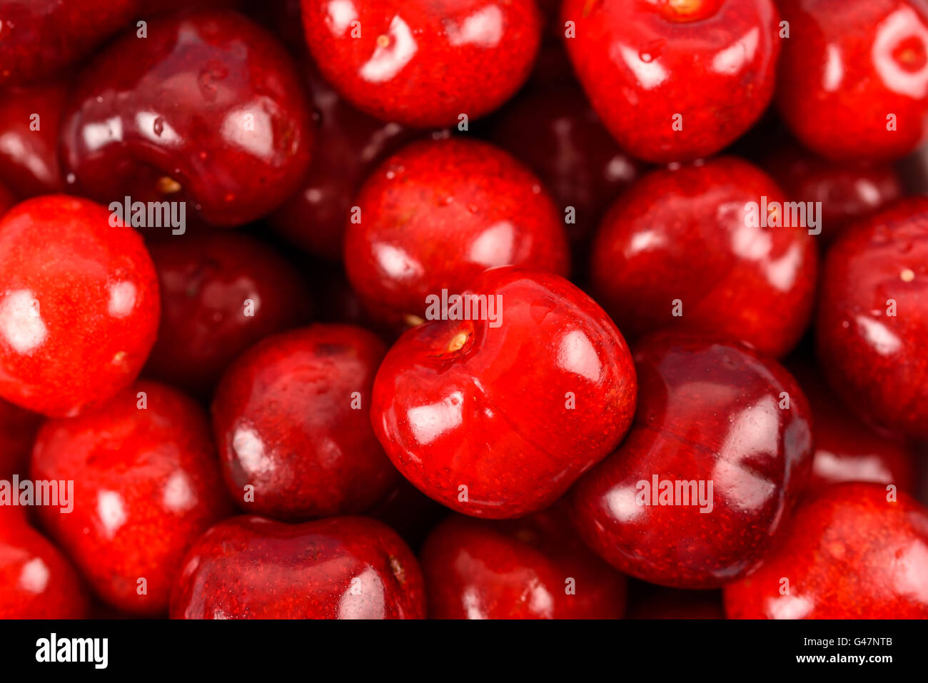 Fresh Red Cherry Fruits Closeup Stock Photo - Alamy