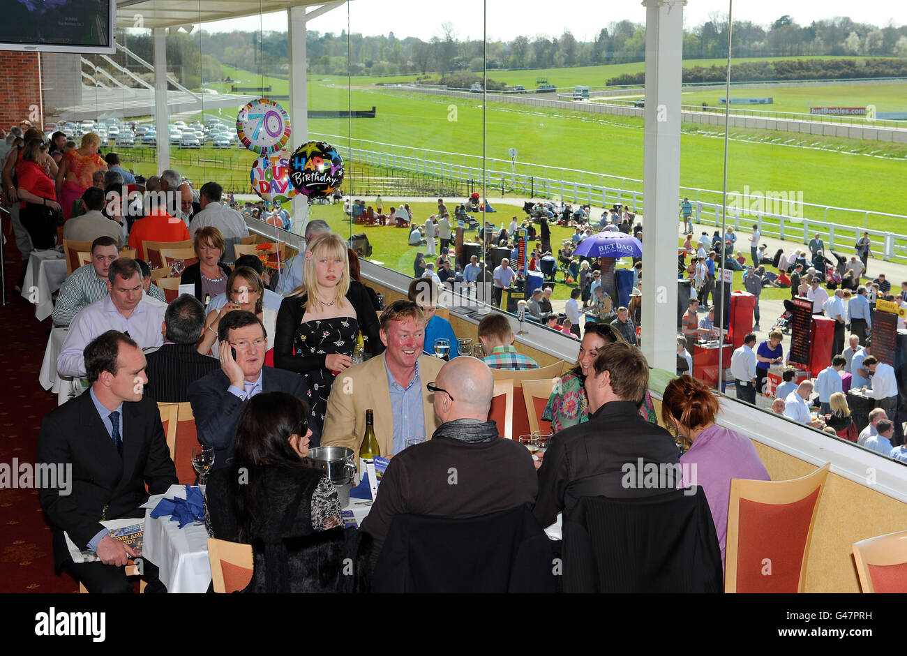 Racegoers in the hospitality area at lingfield park racecourse hi-res ...