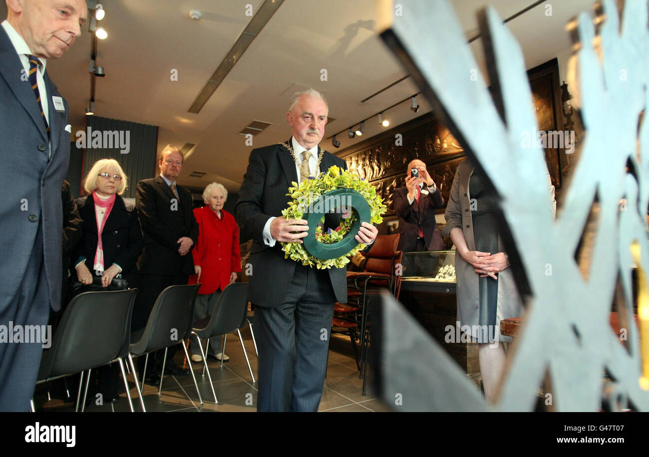 Belfast High Sheriff Ian Adamson lays a wreath in the War Memorial ...