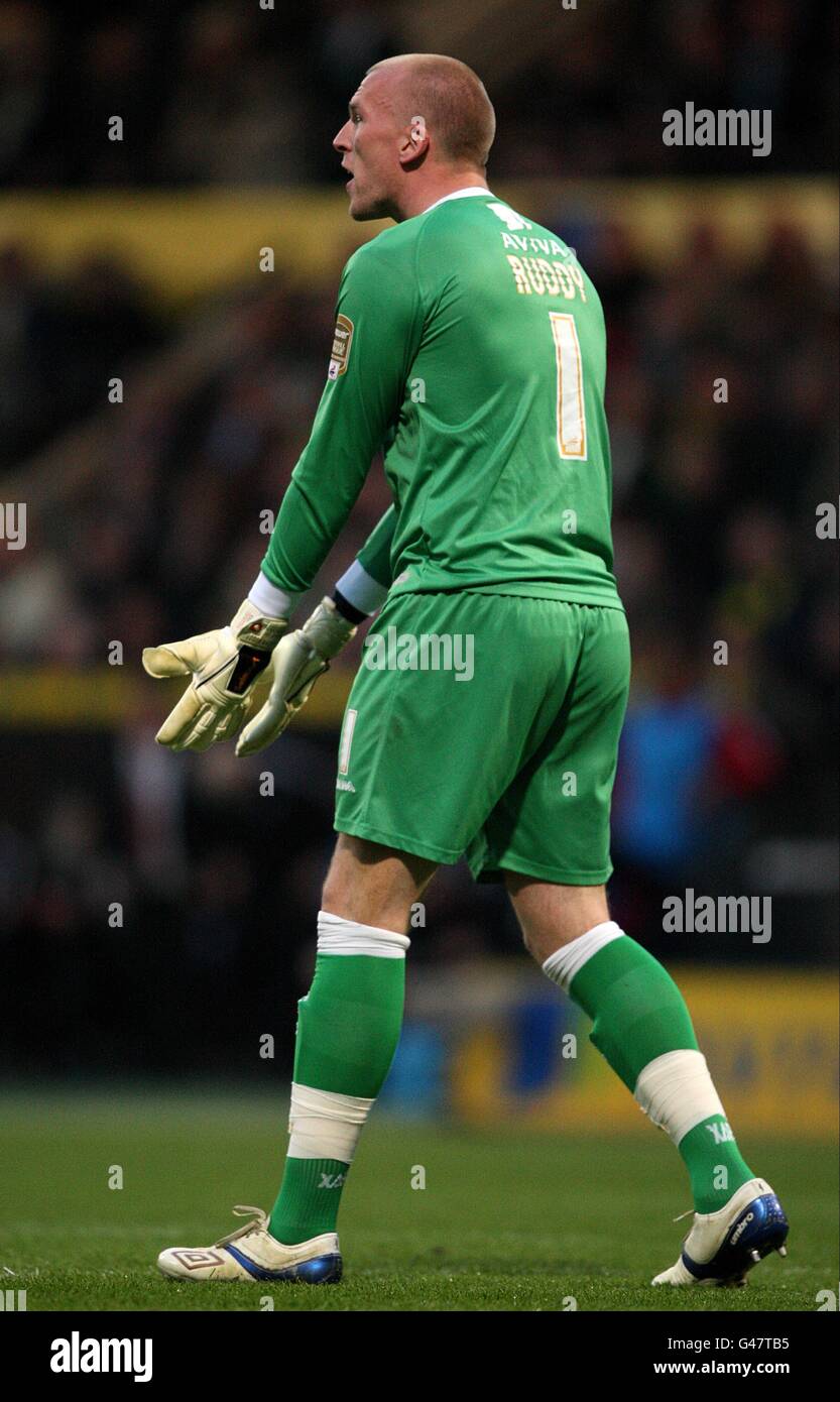 Norwich City goalkeeper John Ruddy dejected after kicking the ball at ...