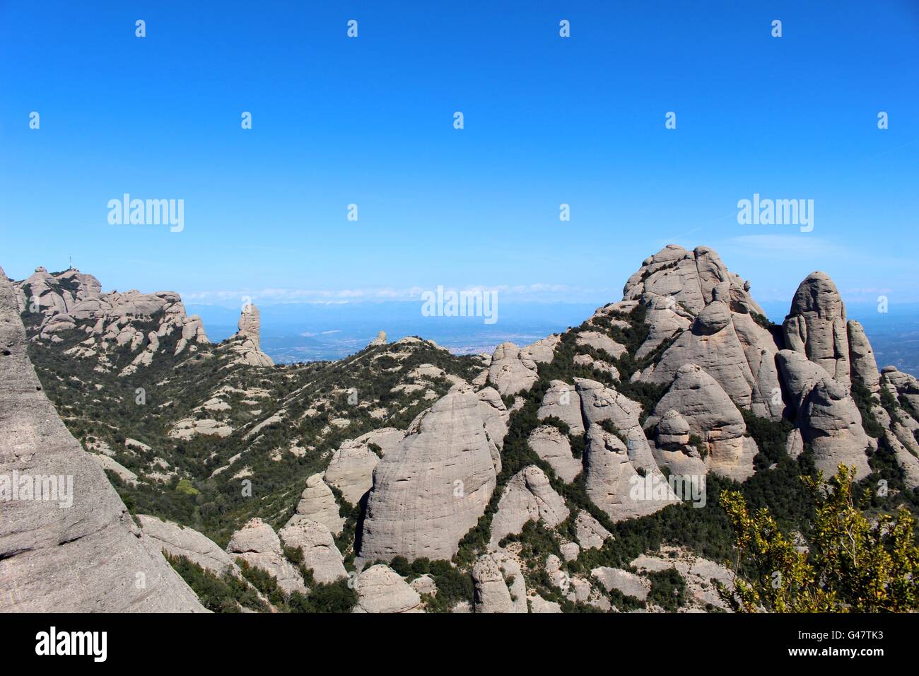 The serrated peaks that give Montserrat Mountain its name Stock Photo ...