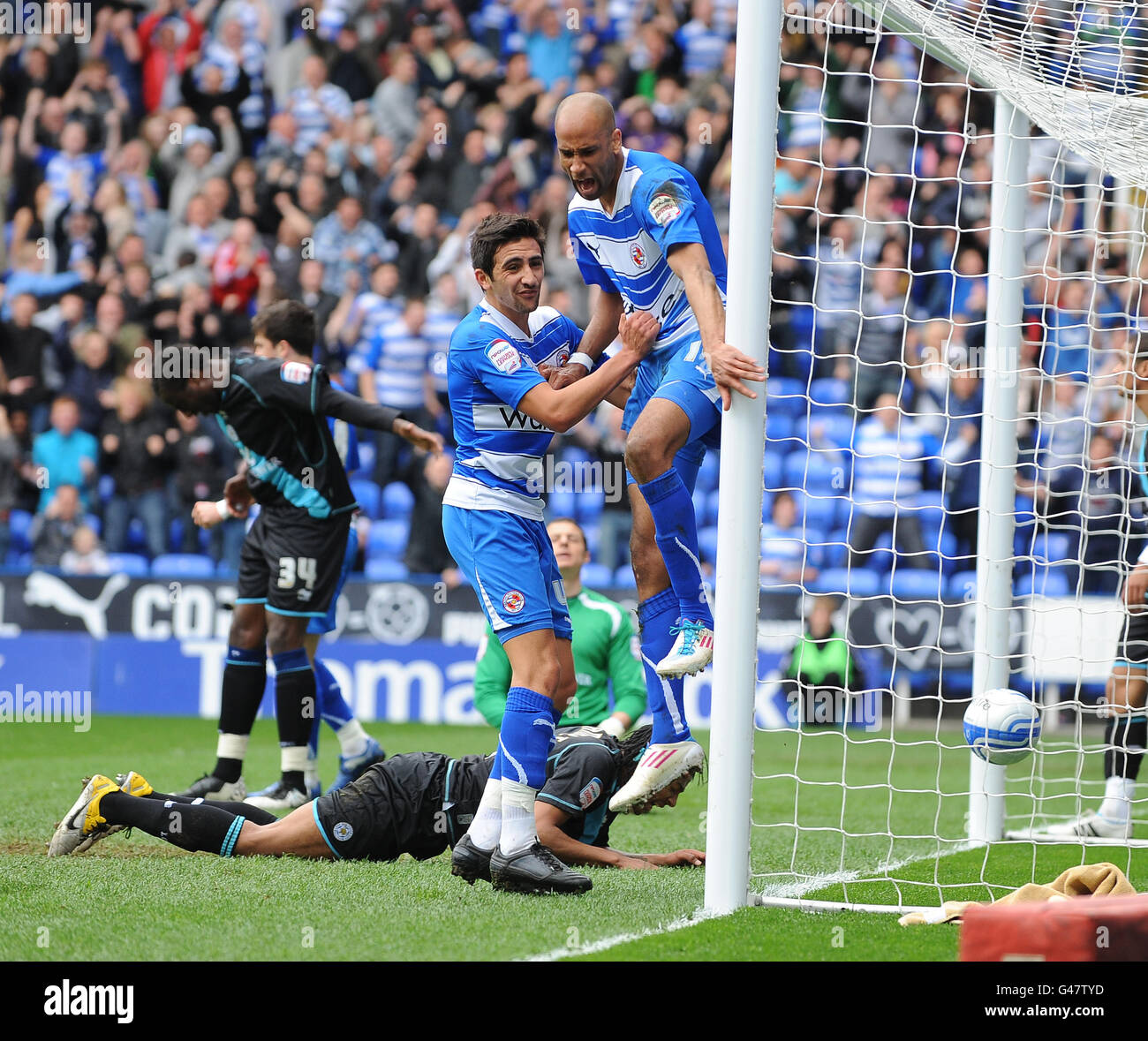 Reading's Jimmy Kebe (right) celebrates after scoring their first goal ...
